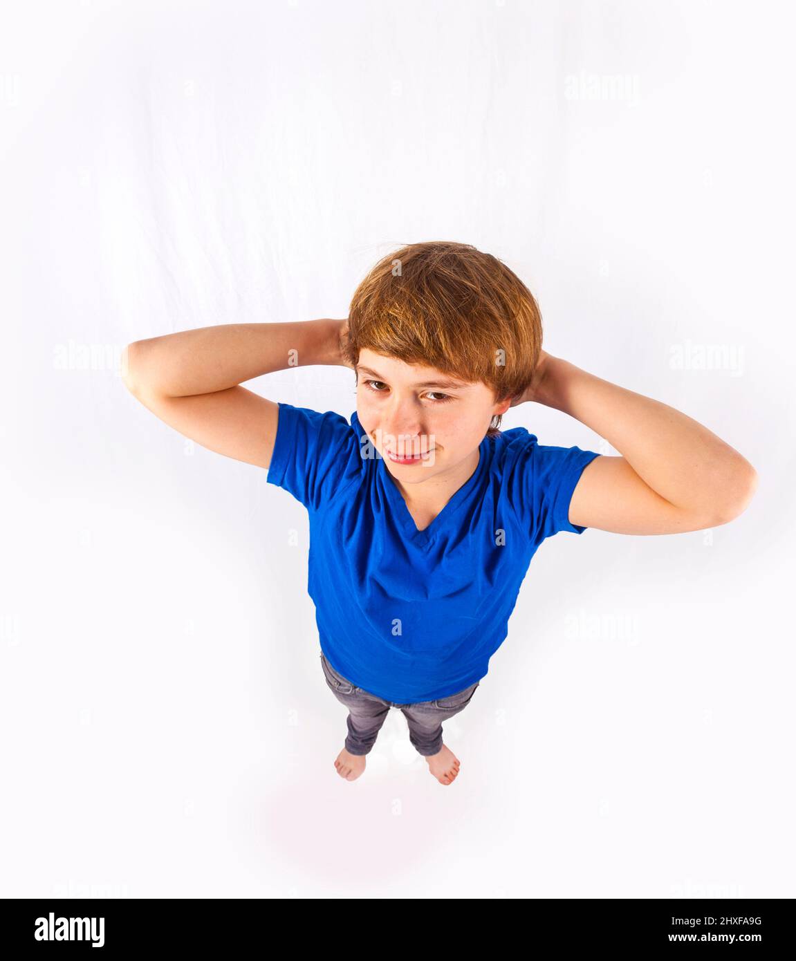 funny perspective of standing handsome boy Stock Photo - Alamy