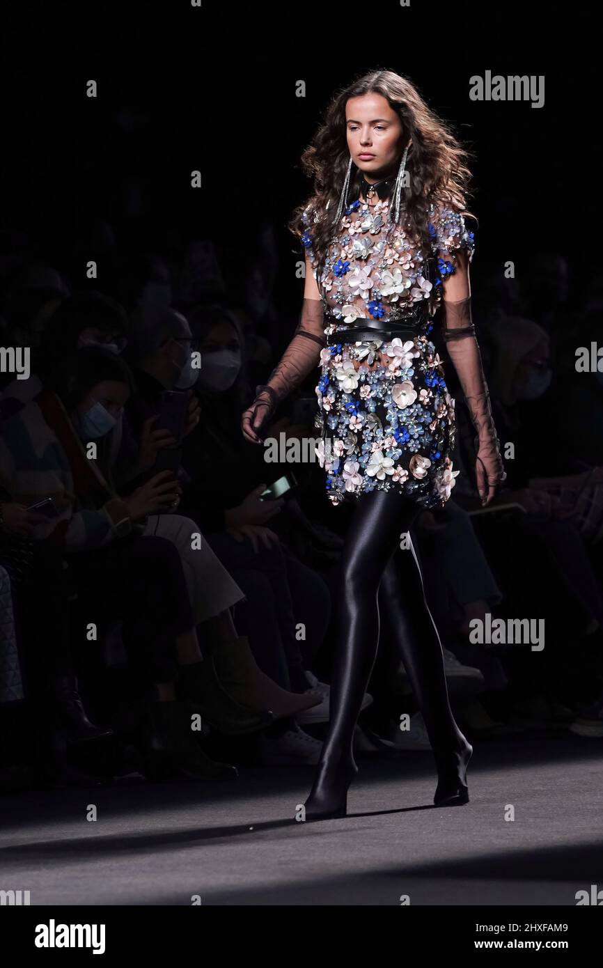 Madrid, Spain. 12th Mar, 2022. A model walks the runway at the Claro ...