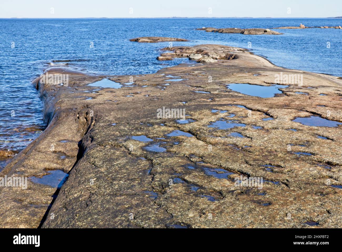 Rocky seashore on the island of Ulko-Tammio, Eastern Gulf of Finland ...