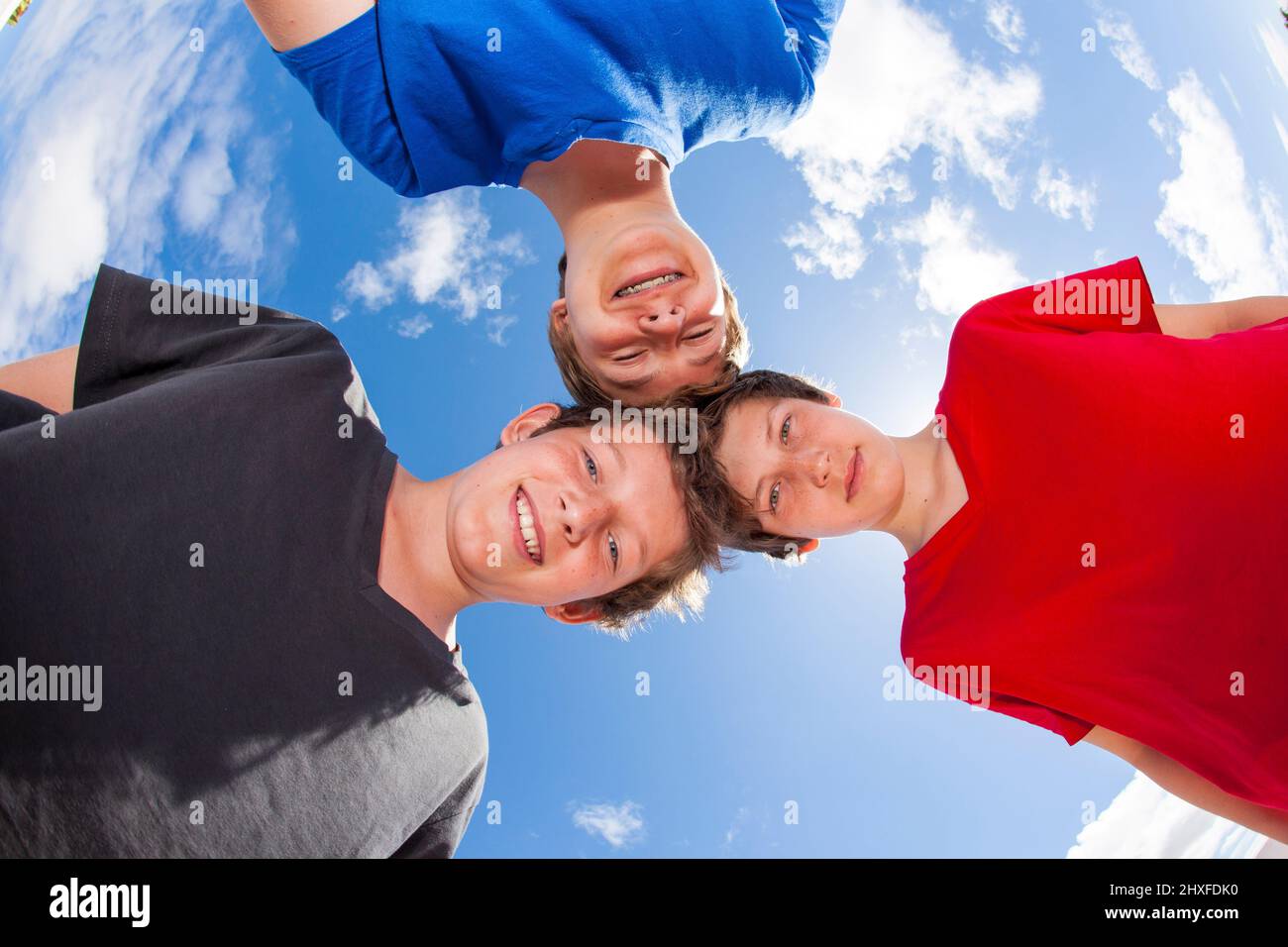 three friends stick together and have fun Stock Photo - Alamy