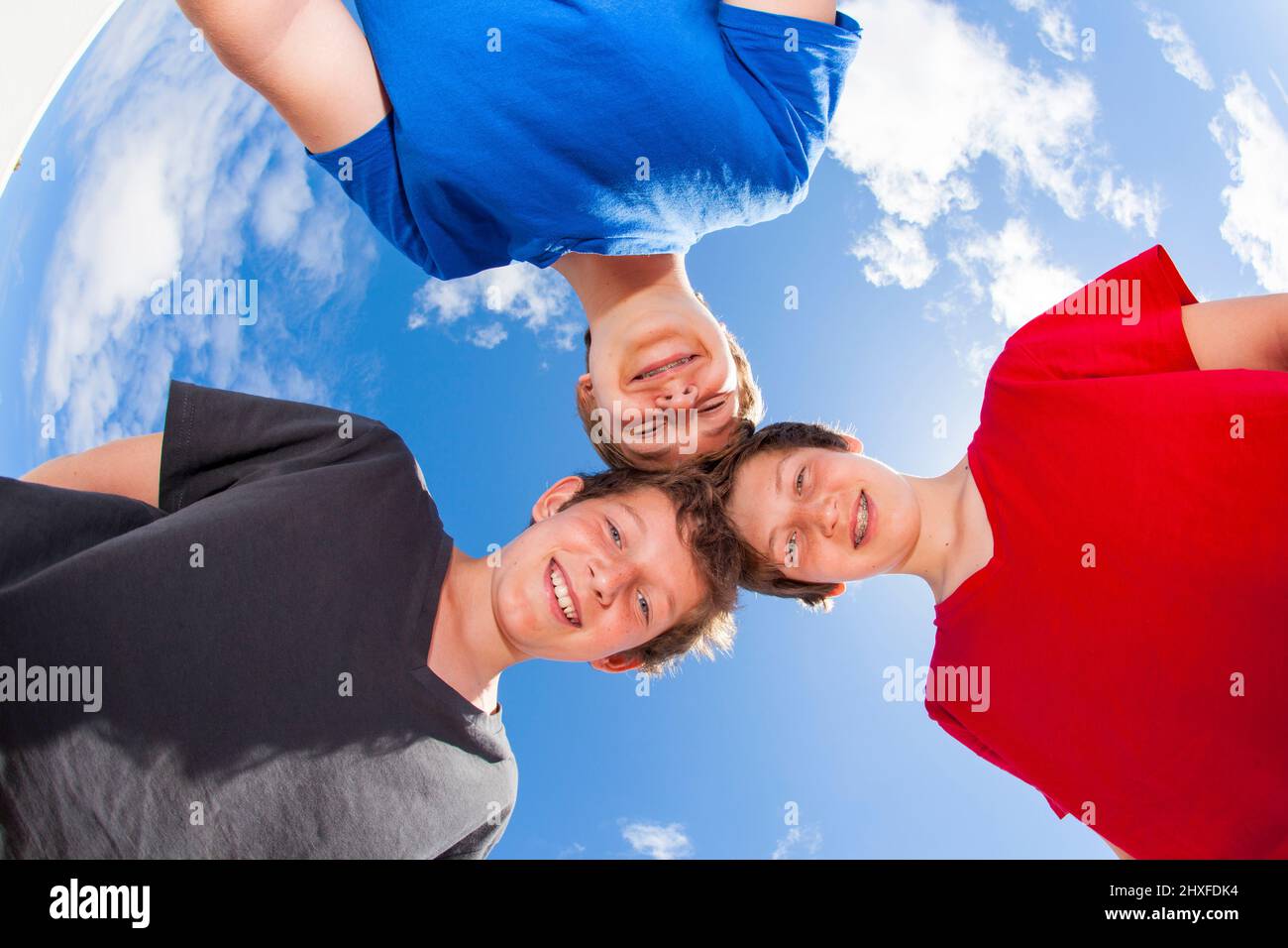 three friends stick together and have fun Stock Photo - Alamy