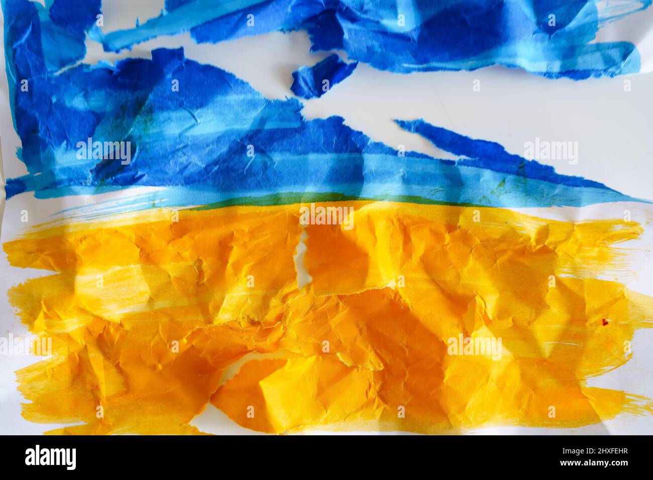Ukraine colors at the folded black paper Stock Photo - Alamy