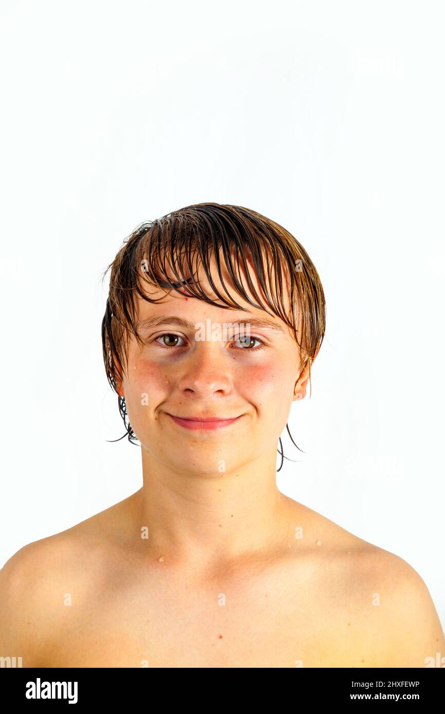 smart handsome boy with wet hair poses in Studio Stock Photo - Alamy