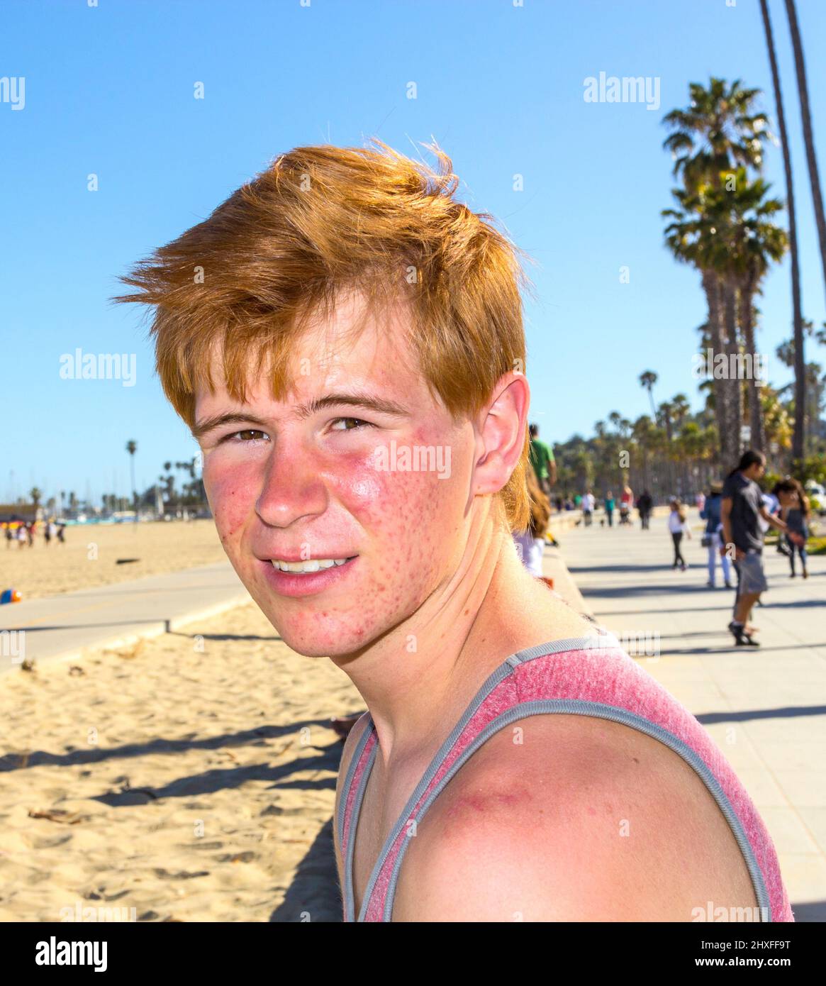 smiling attractive boy with red hair poses at the beach Stock Photo - Alamy