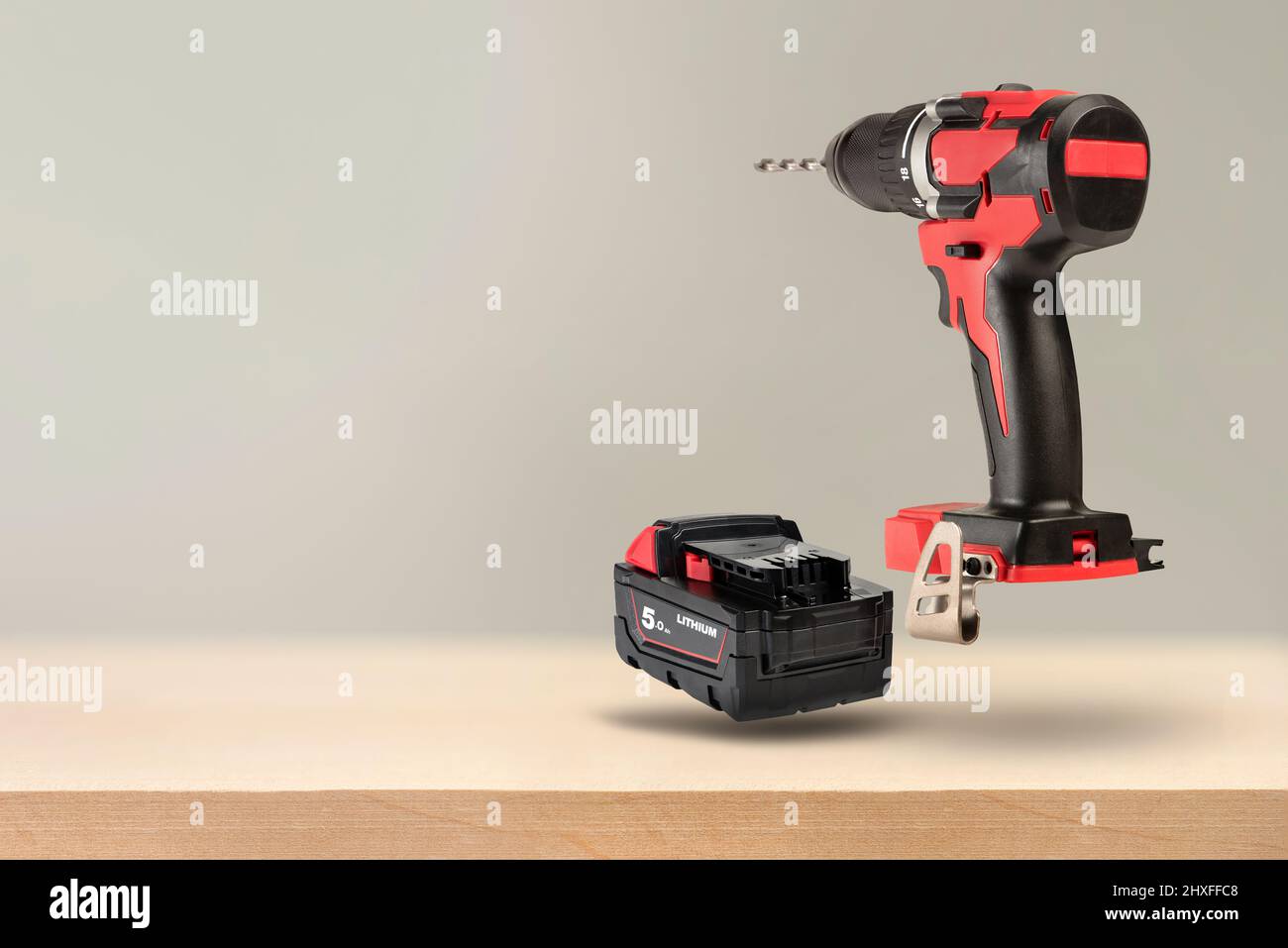 Wireless tools. Cordless drill with drill bit. The screwdriver with the ...