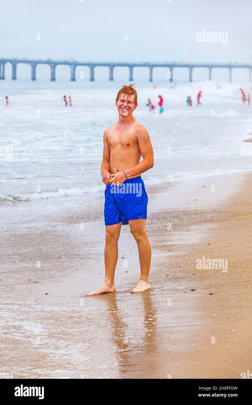 attractive young boy at the beach Stock Photo - Alamy