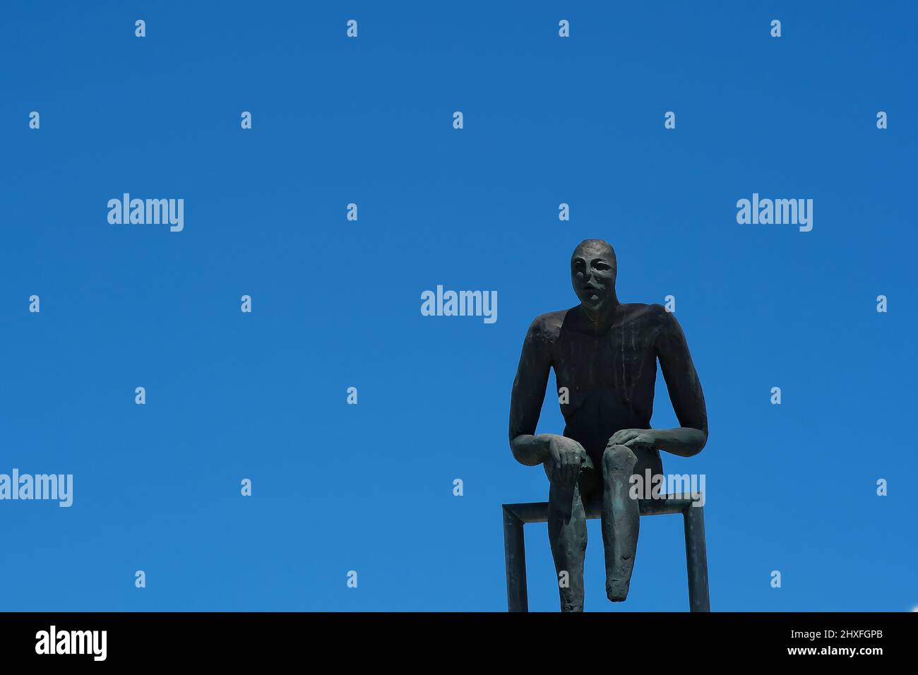 Sitting man sculpture sculpture center hi-res stock photography and ...