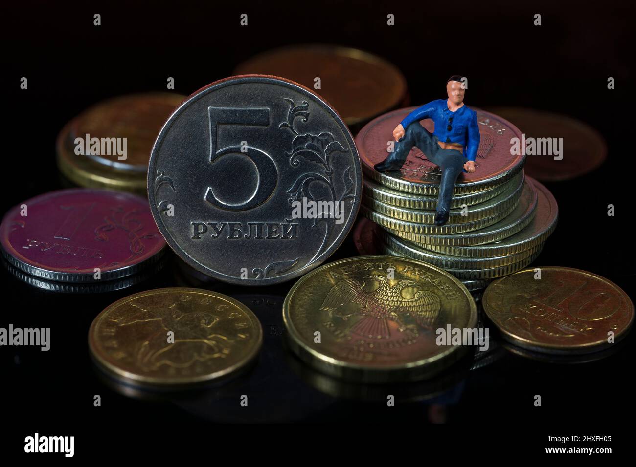Russian ruble coins. The fall of the ruble. Ruble collapse Stock Photo ...