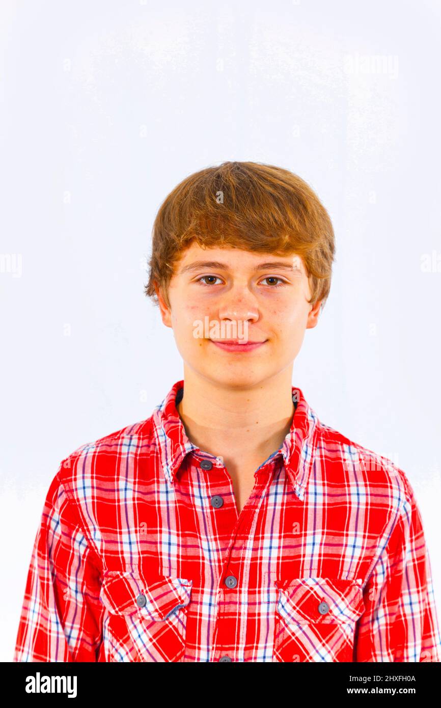 attractive smiling boy in studio Stock Photo - Alamy