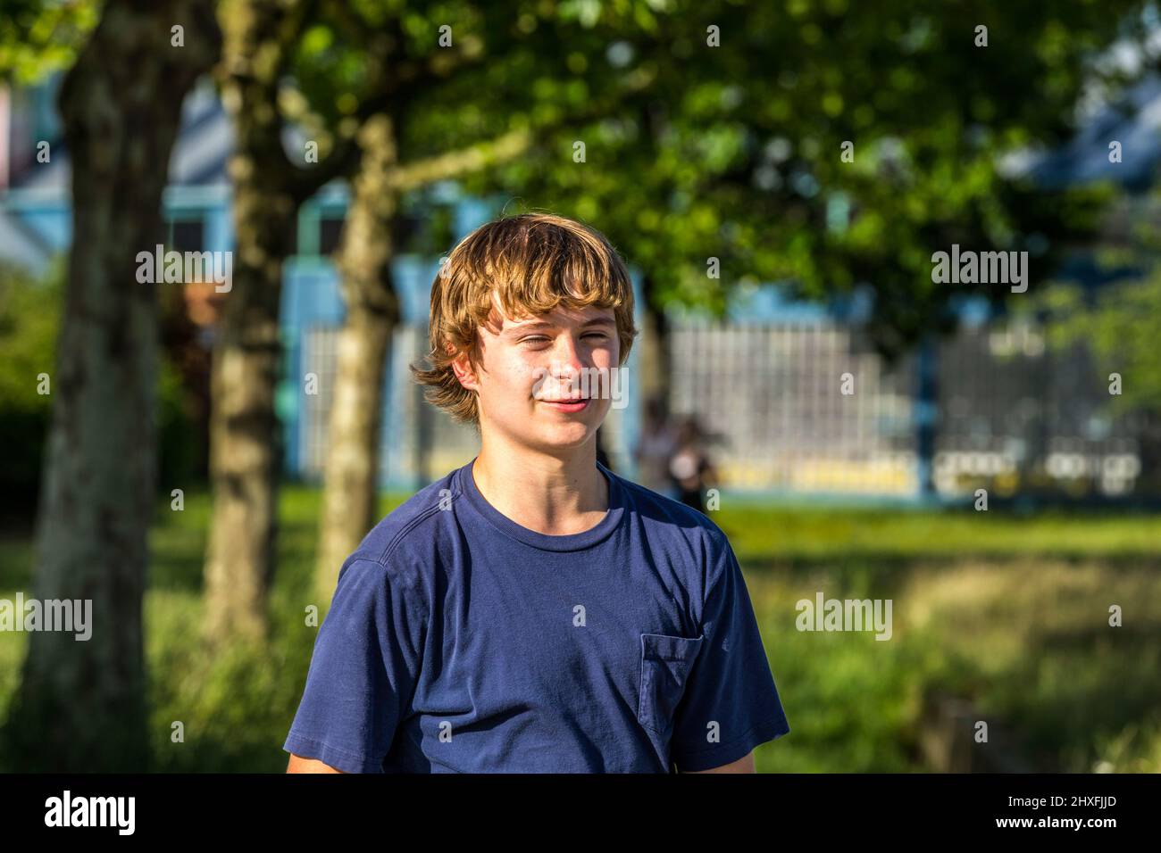 boy in motion is happy and smiles Stock Photo - Alamy