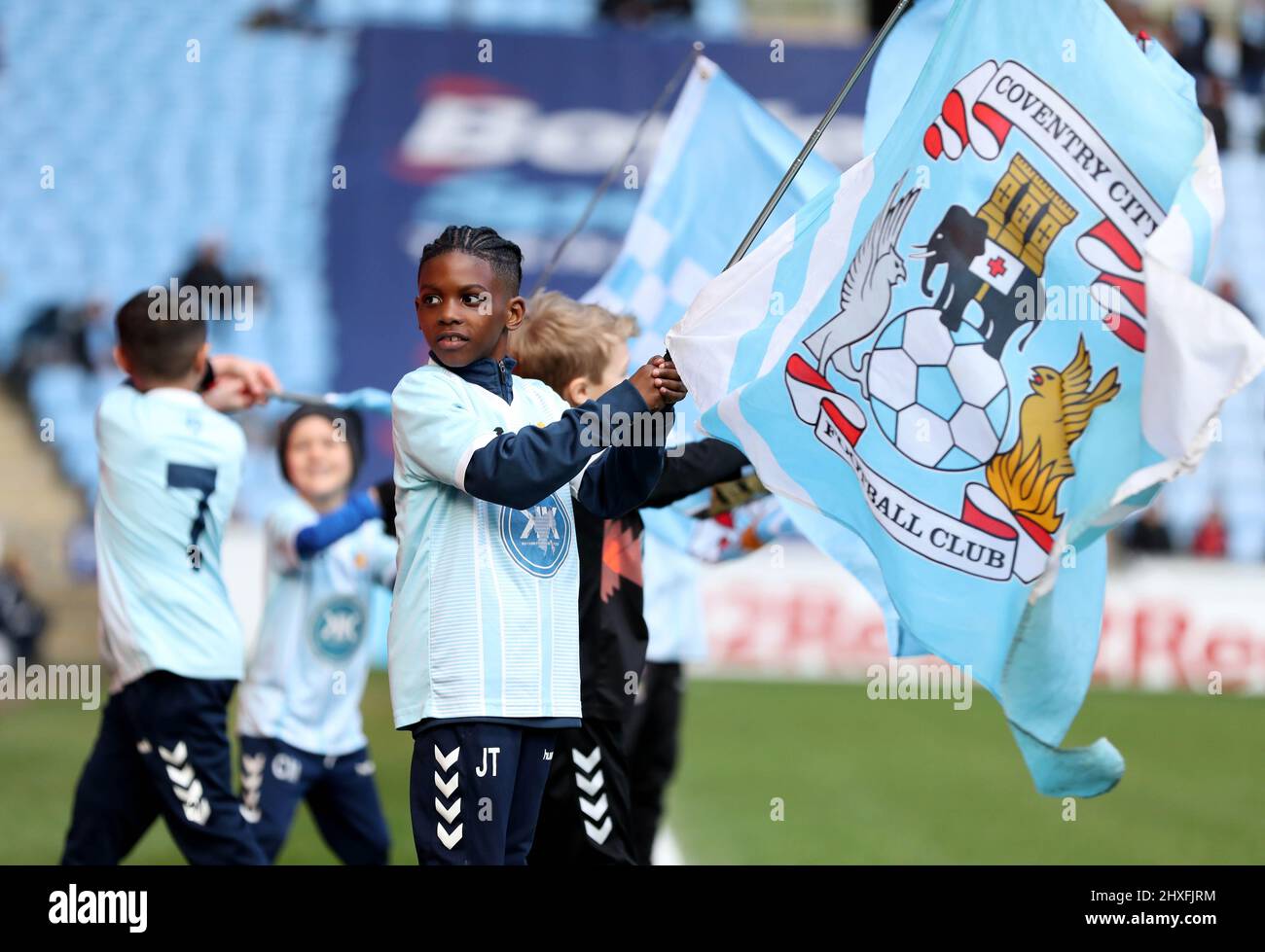 Flag wavers on the pitch ahead of the Sky Bet Championship match at ...