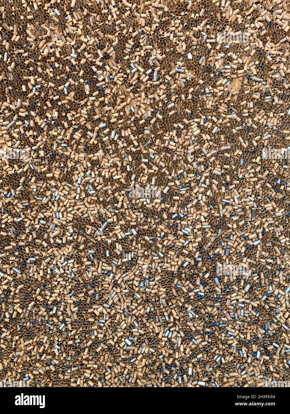 Background of many used pistol bullet shells Stock Photo - Alamy