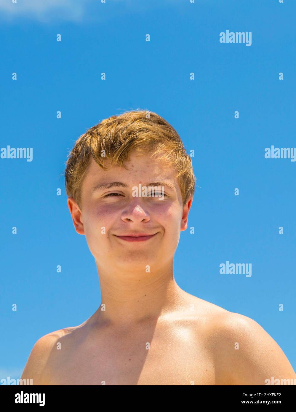 cute happy boy after swimming at the sunny beach Stock Photo - Alamy