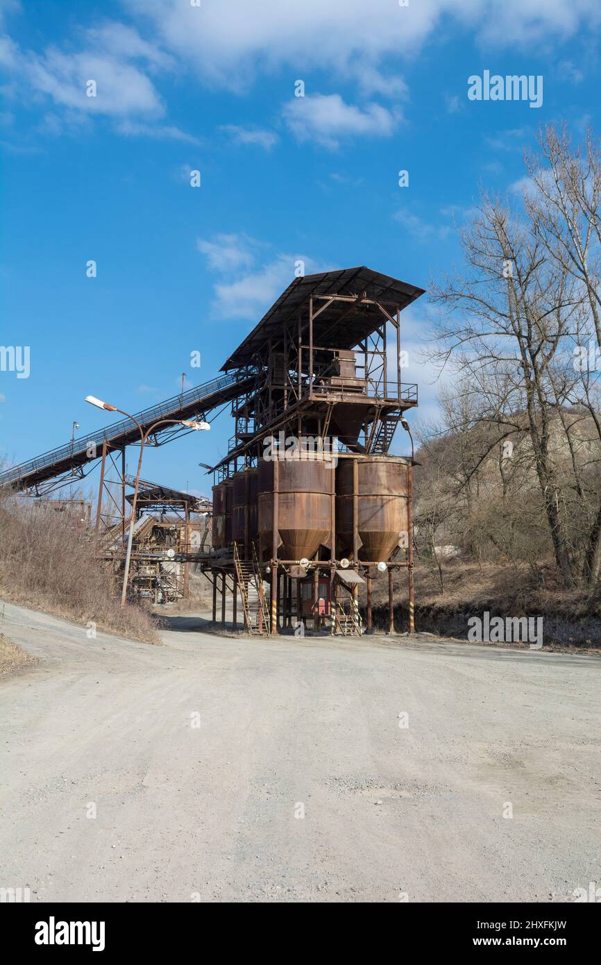 An old gravel quarry. Mining and quarrying equipment. Granite gravel ...
