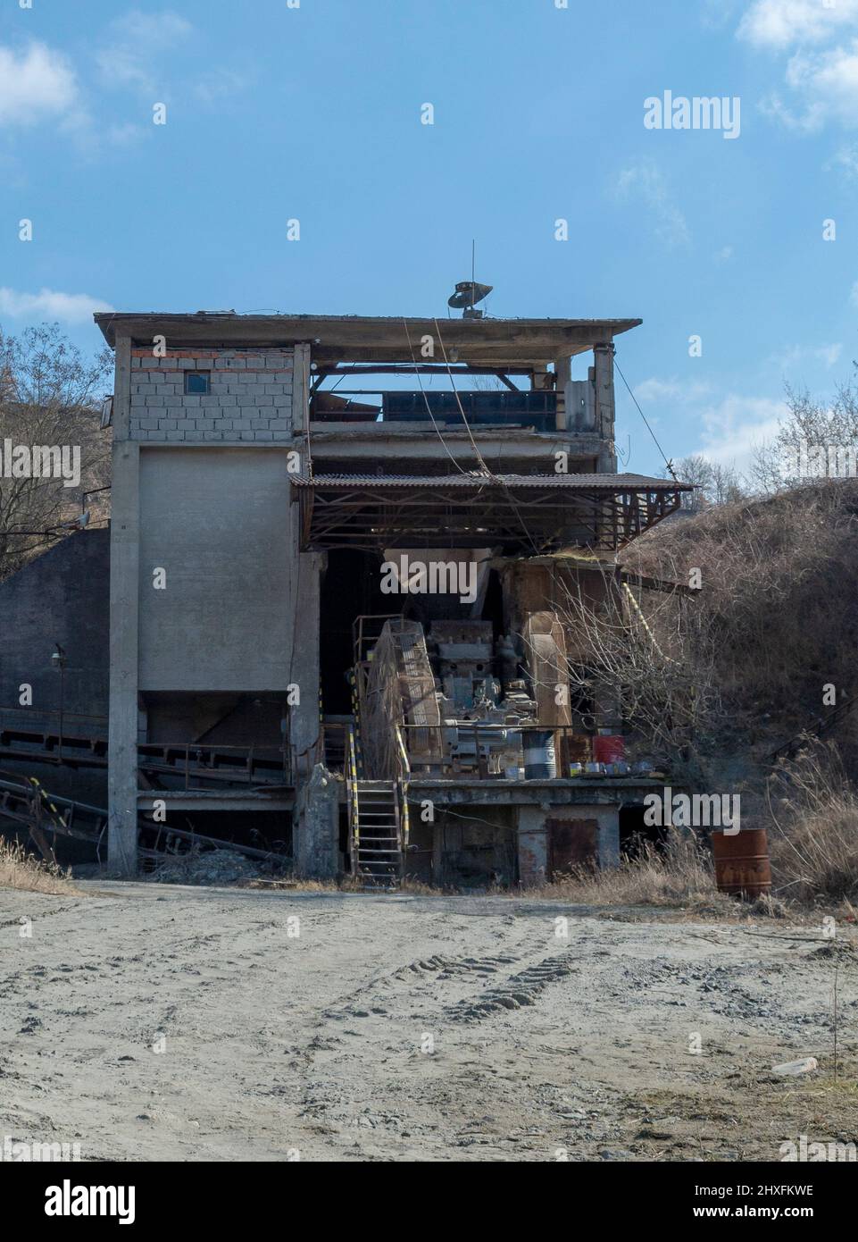 An old gravel quarry. Mining and quarrying equipment. Granite gravel ...