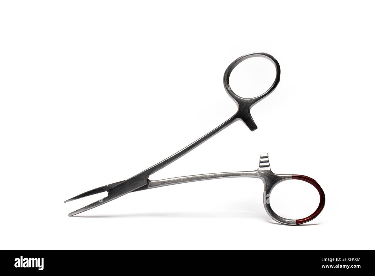 Close up of a medical instrument surgical clamp for doctor to remove ...