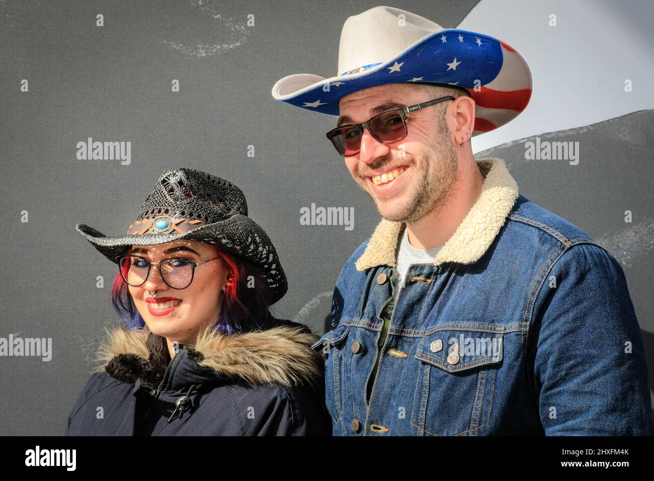London, UK. 12th Mar, 2022. Country music fans and visitors attend the ...