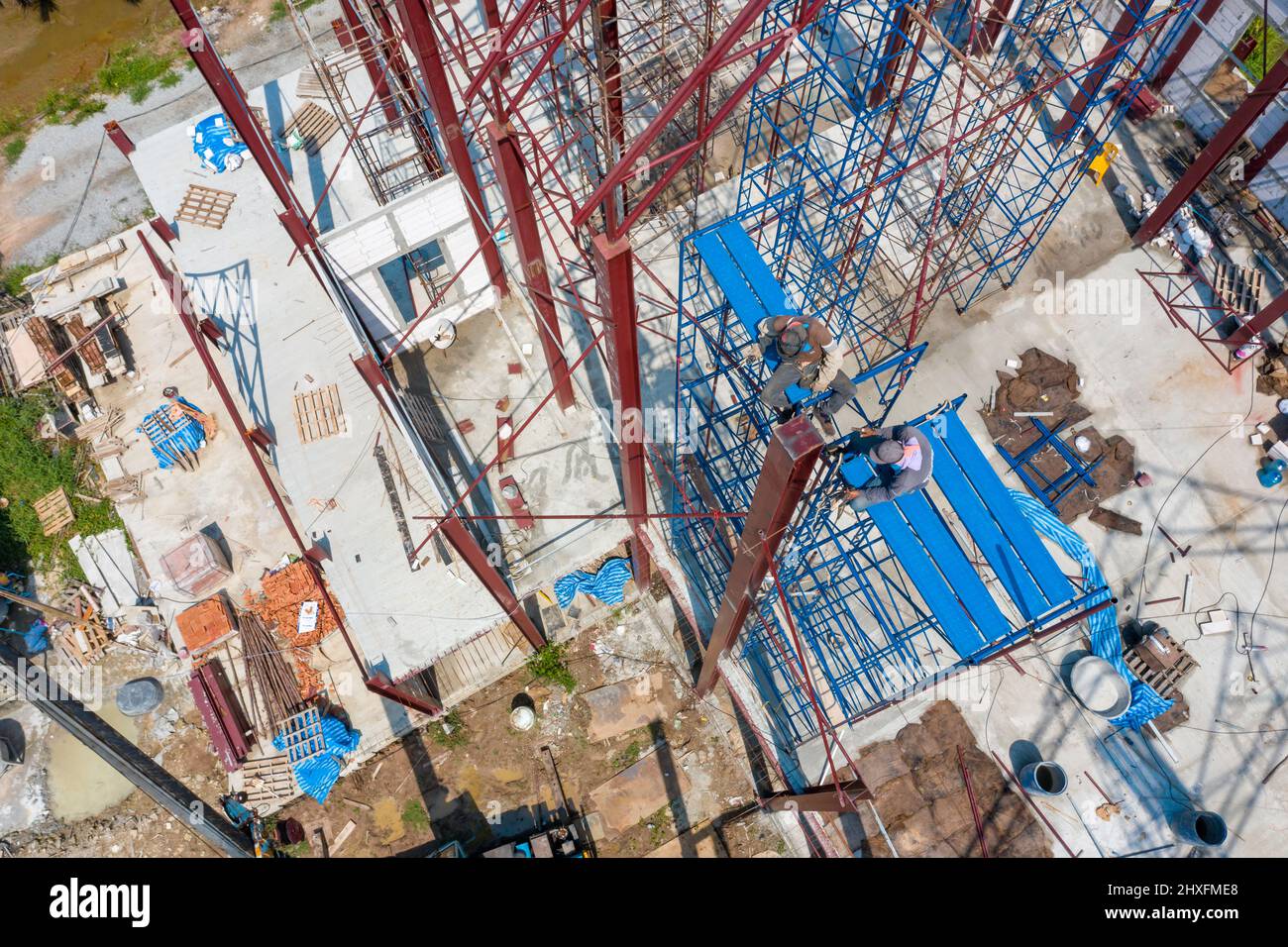 Dual Asian Welder and blacksmith work on the height scaffolding, Shoot ...