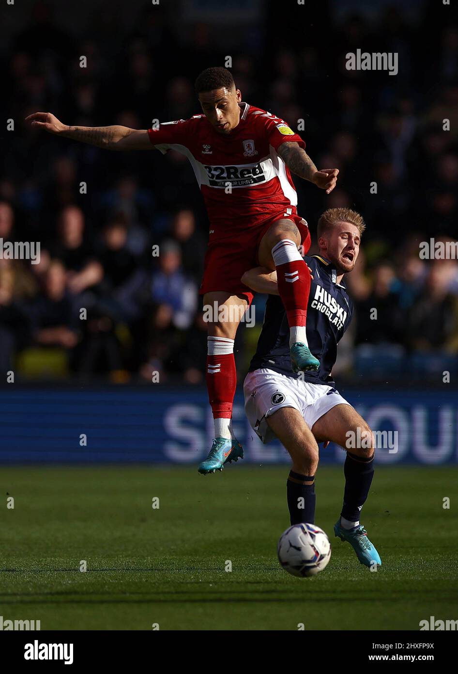 Middlesbrough's Lee Peltier (left) and Millwall's Billy Mitchell battle ...