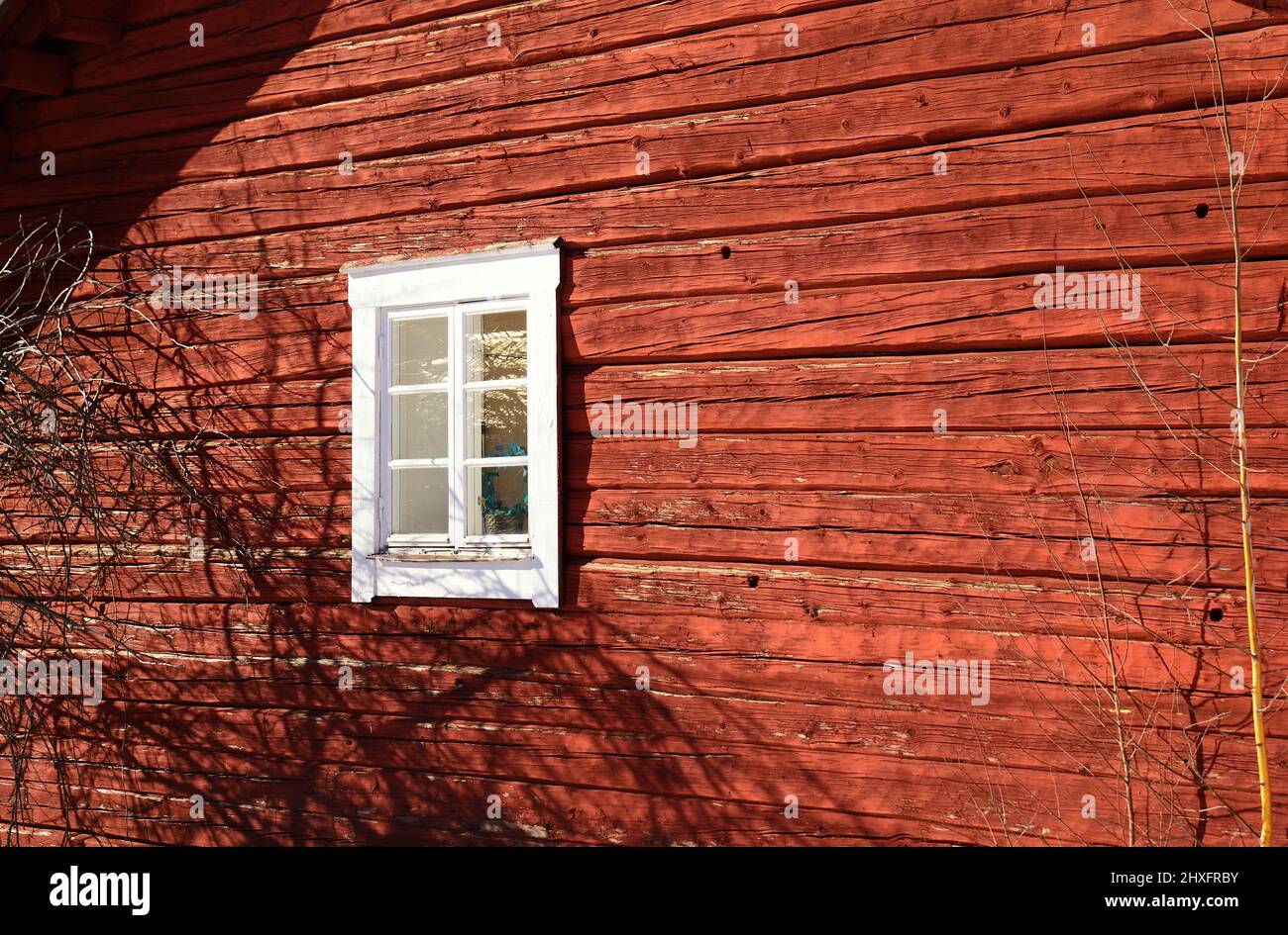 Small red Swedish cottage in winter Stock Photo - Alamy