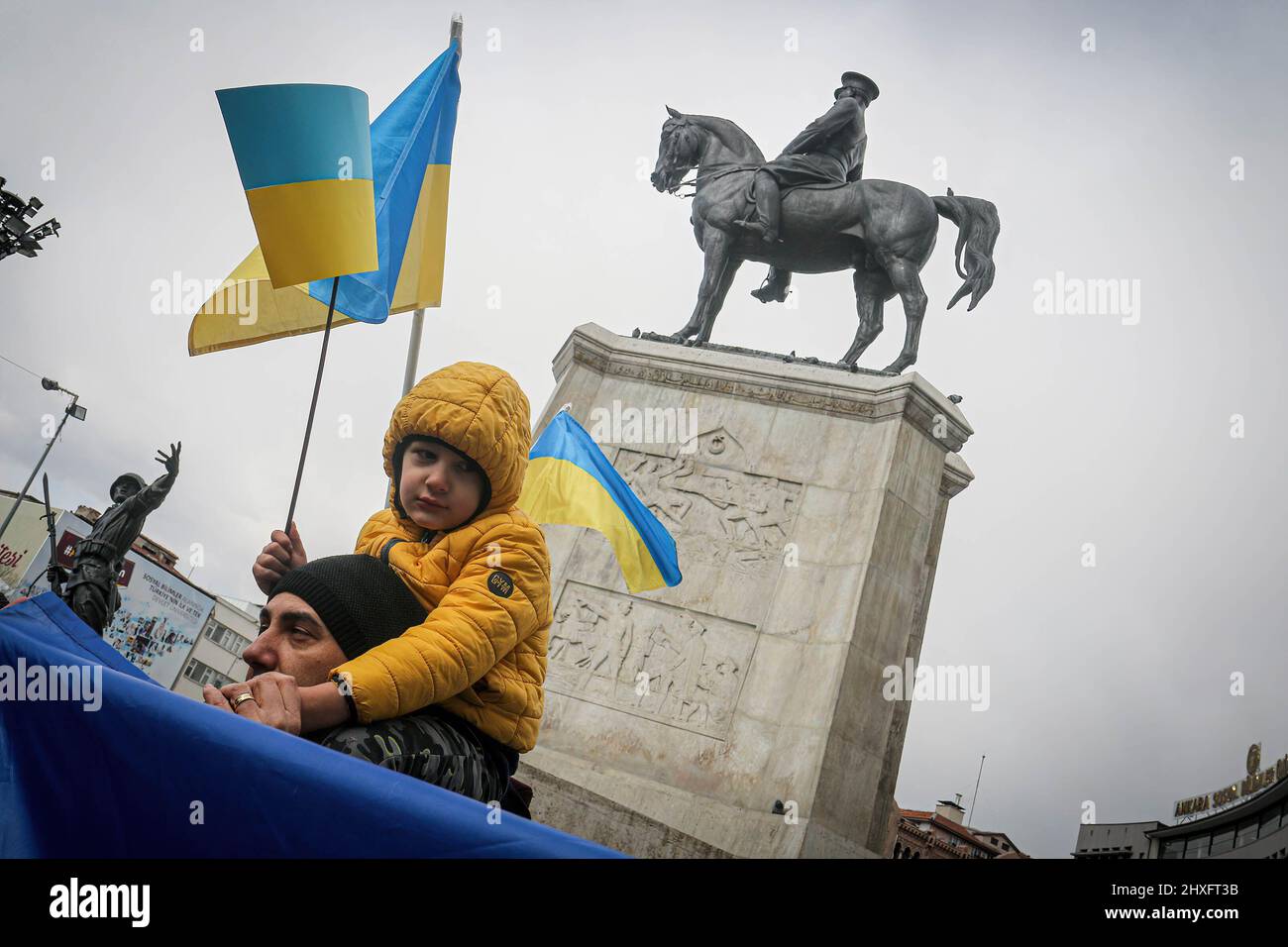 Ankara, Turkey. 12th Mar, 2022. A Ukrainian boy waves a flag on his ...
