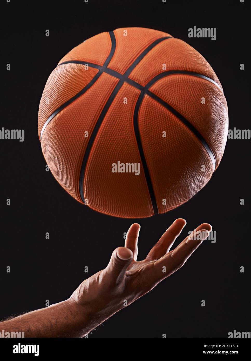 Time to raise your game. Cropped image of a mans hand holding a ...