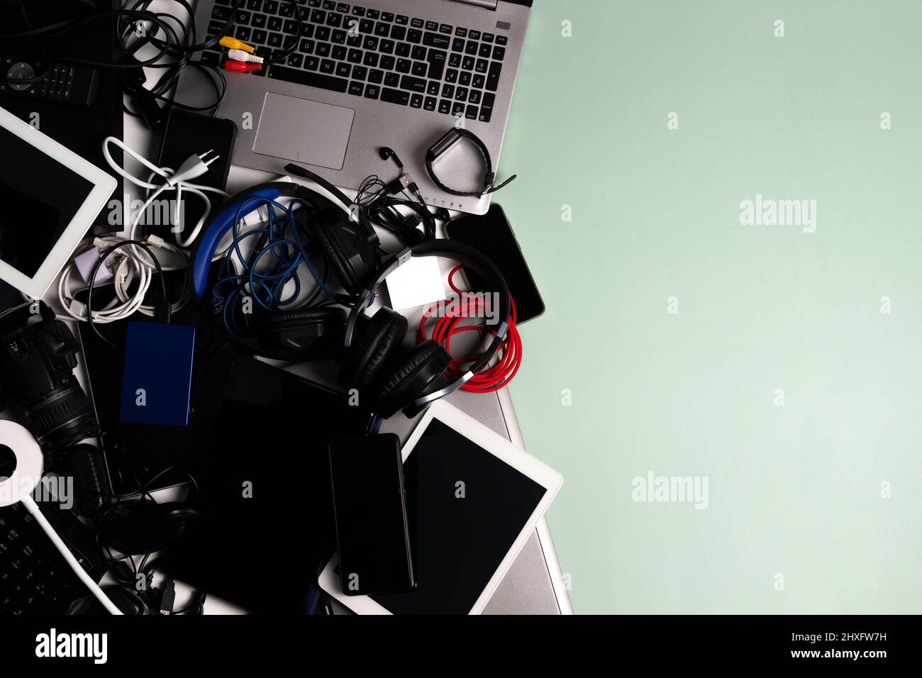 Old computers, digital tablets, mobile phones, many used electronic ...