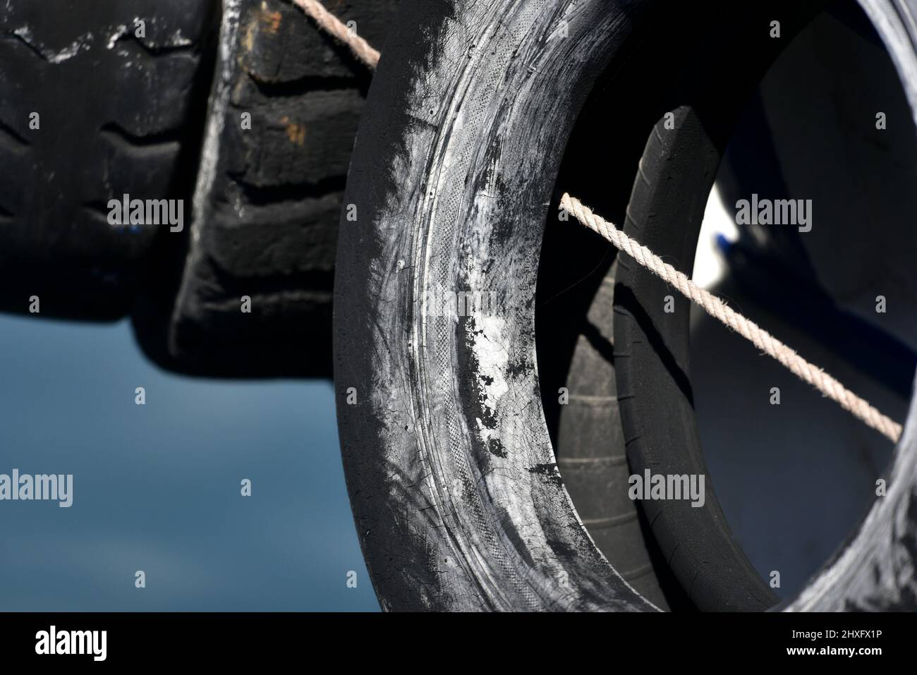 Weathered scrap rubber tires as a shield on a tugboat Stock Photo - Alamy