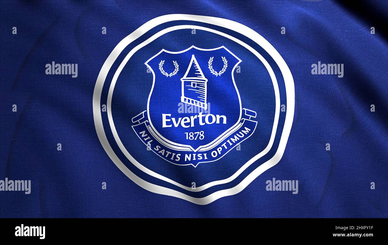 Flying flag with Everton FC football club logo, close up. Motion ...