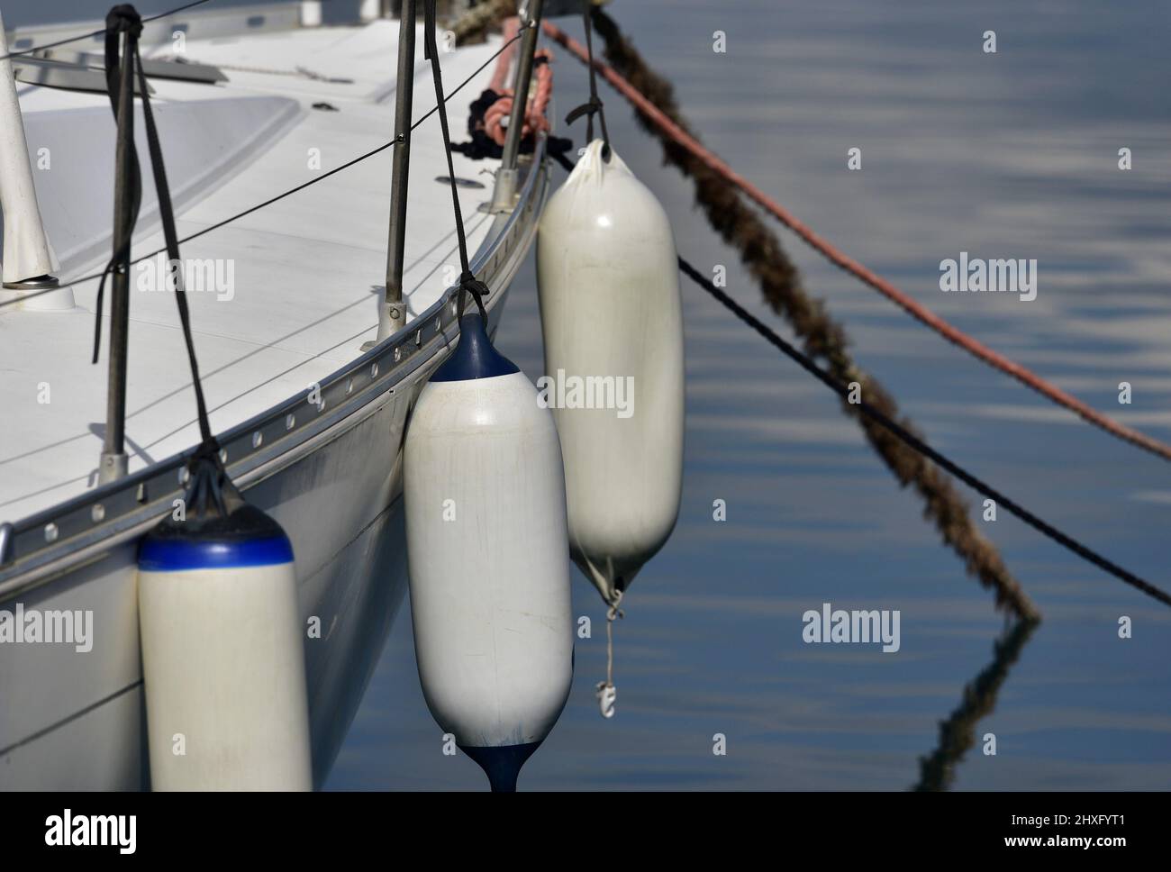 Traditional Greek sailing boat starboard with heavy duty blue and white ...