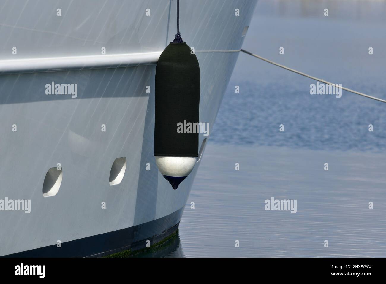 Traditional Greek sailing boat heavy duty balloon fender Stock Photo ...
