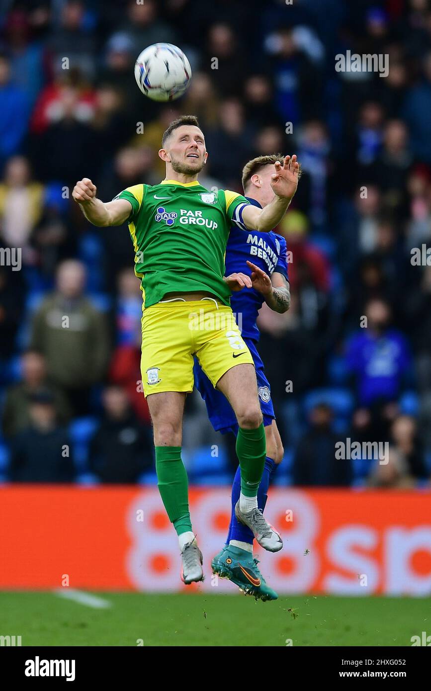 Alan Browne #8 of Preston North End wins the high ball over Isaak ...