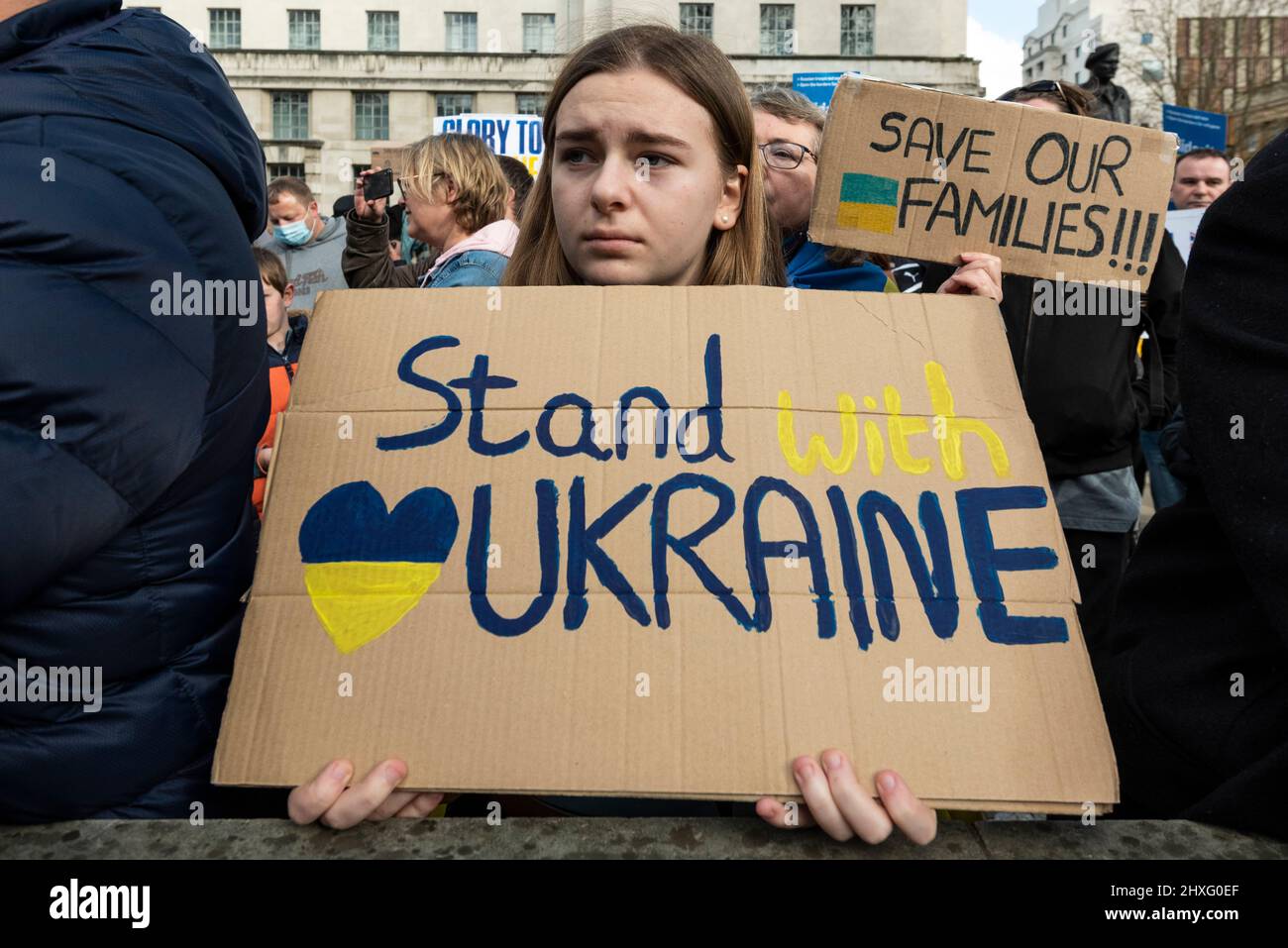 London, UK. 12 March 2022. A demonstrator shows solidarity with the ...