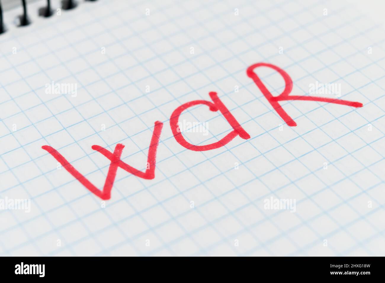 Word WAR in a notepad. Red text. Military occupation concept. Macro ...