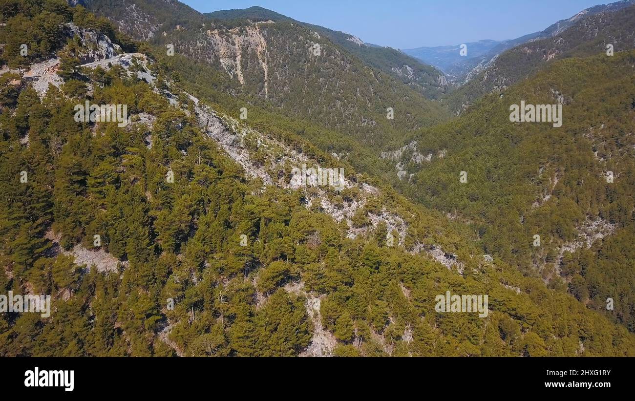 A bird's-eye view of huge mountains. Clip. Huge green summer mountains ...
