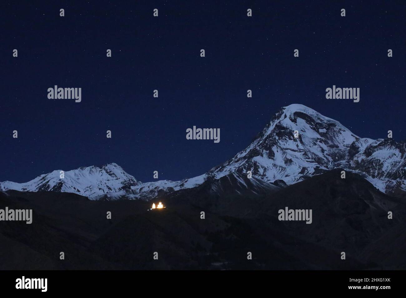 Beautiful night view Qazbegi Mountain valley Stock Photo - Alamy
