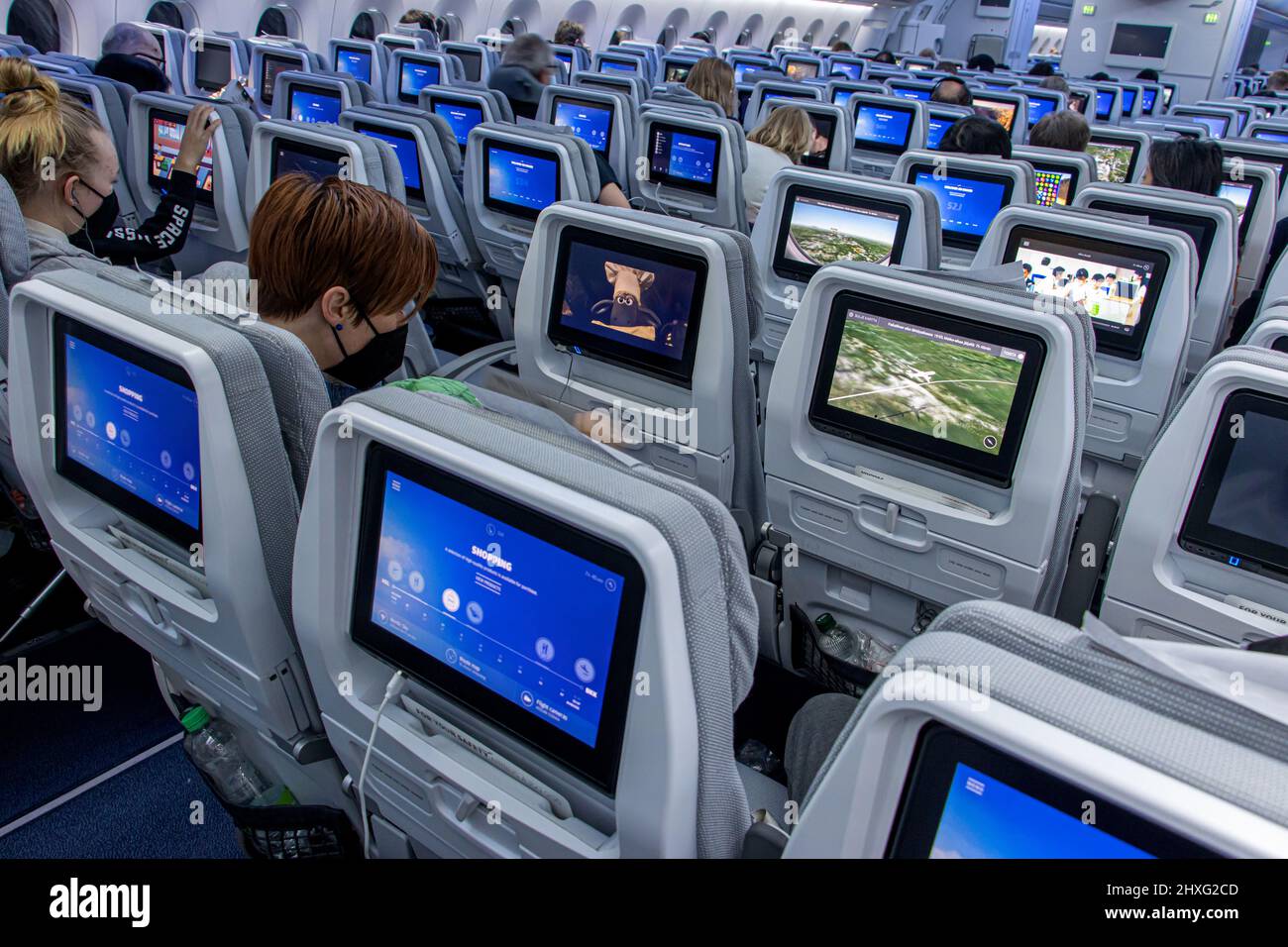 Tv airplane seats tv screen hi-res stock photography and images - Alamy