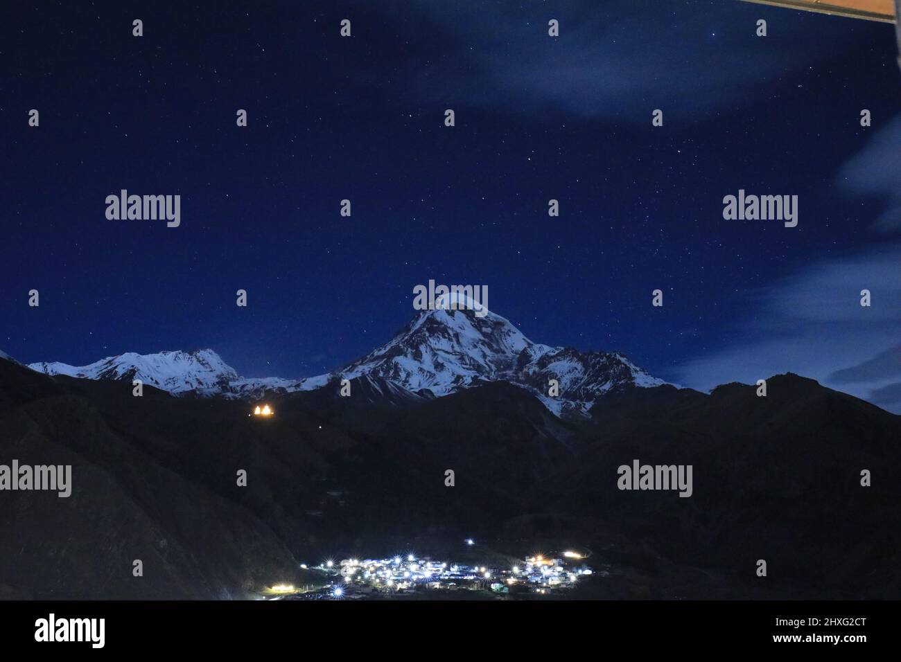 Beautiful night view Qazbegi Mountain valley Stock Photo - Alamy