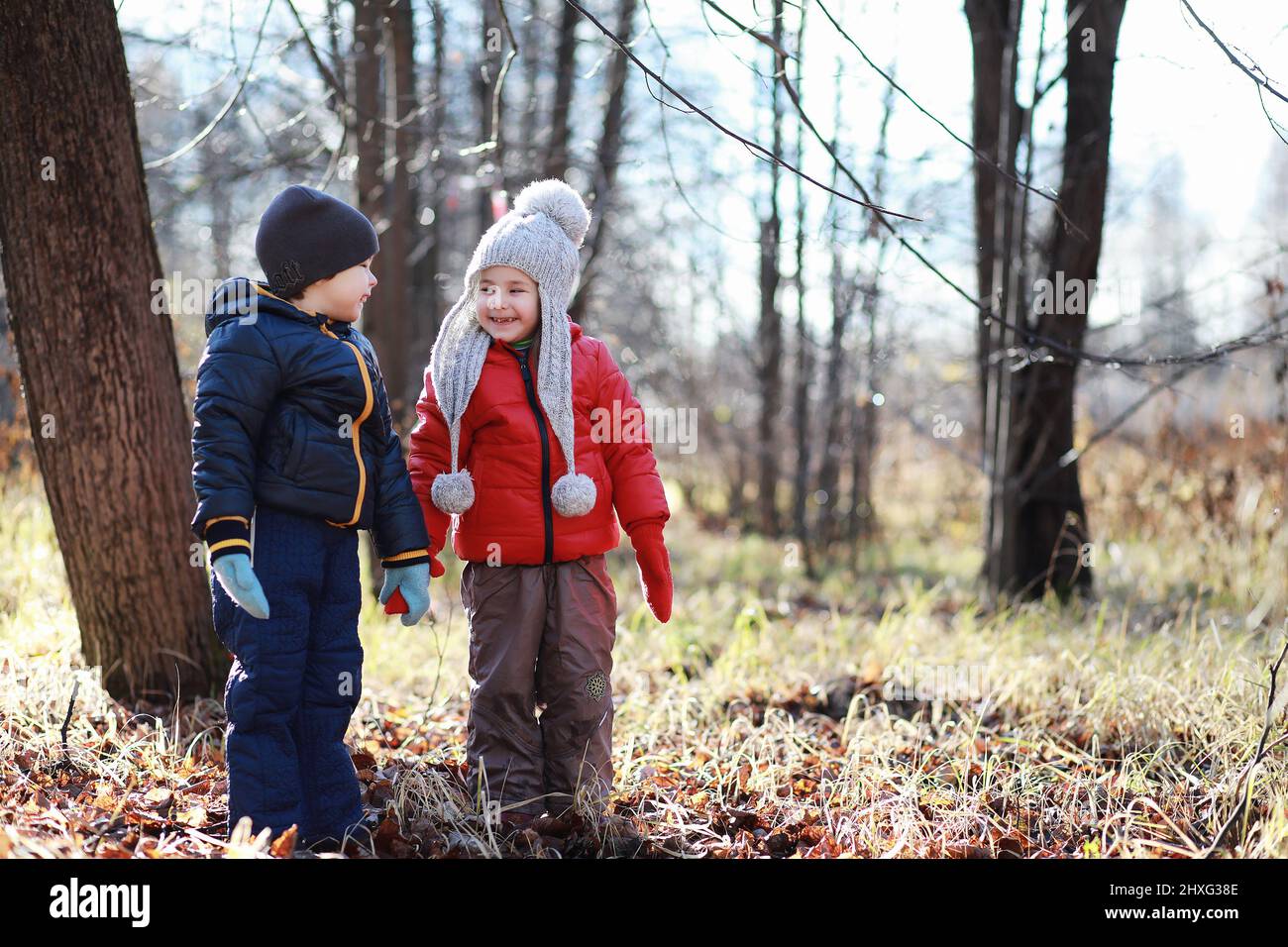 Children walk in the autumn park in the fall Stock Photo - Alamy