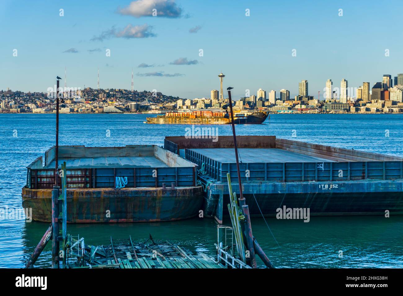 Old pier and barge in West Seattle, Washington Stock Photo - Alamy