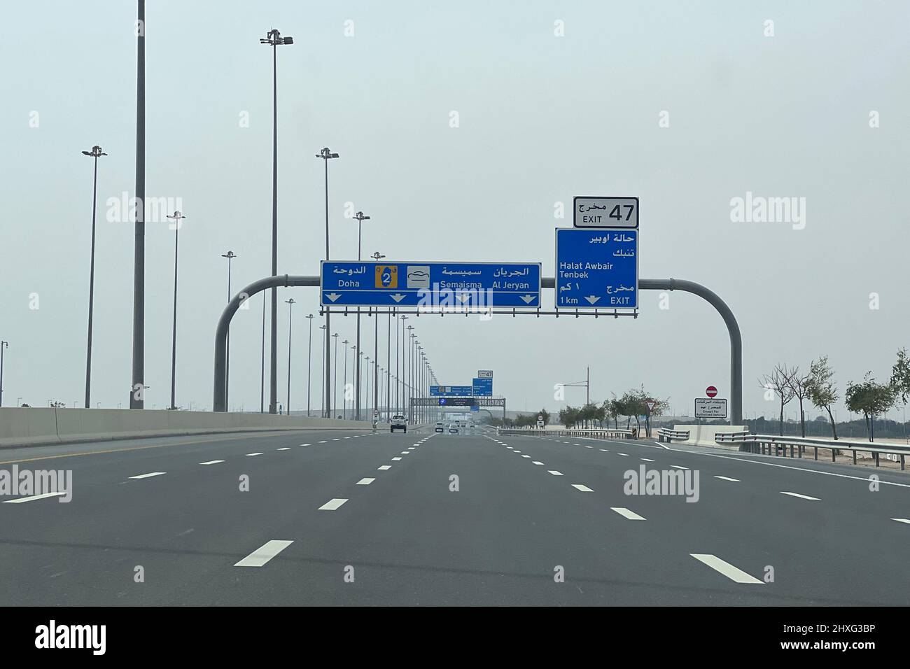 Al Shamal Road highway to Al Khor. Doha Roads and Traffic Stock Photo ...