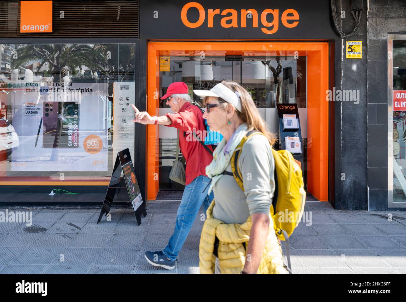 Alicante, Spain. 9th Mar, 2022. Pedestrians walk past the French ...