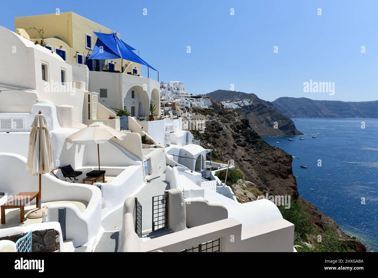 Charming view Oia village on Santorini island, Greece. Traditional ... Charming view Oia village on Santorini island, Greece. Traditional ...