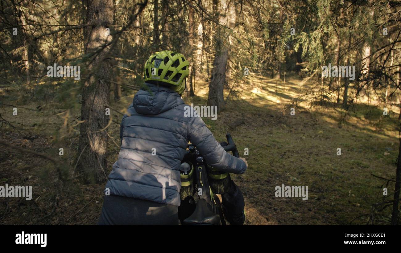 The woman travel on mixed terrain cycle touring with bike bikepacking ...