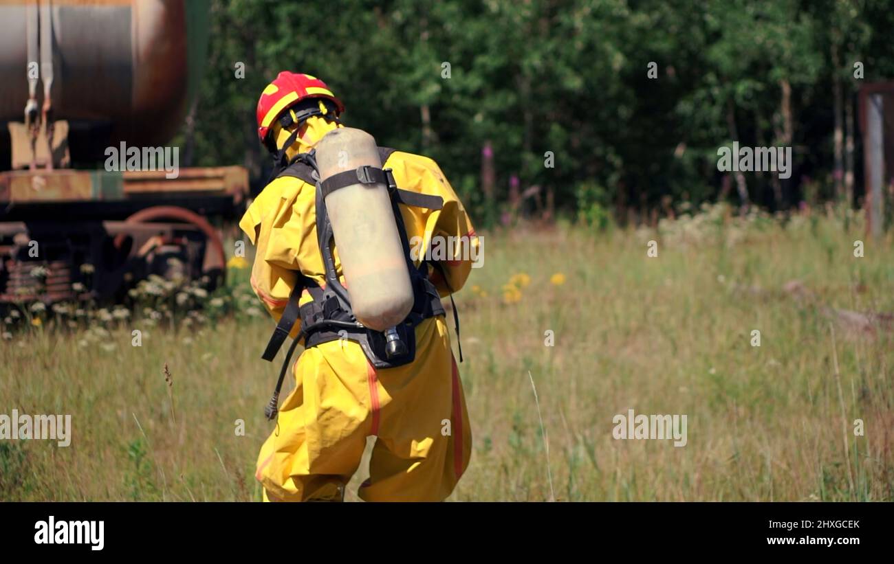 A sign warning of danger. Clip. People performing work in a dangerous ...