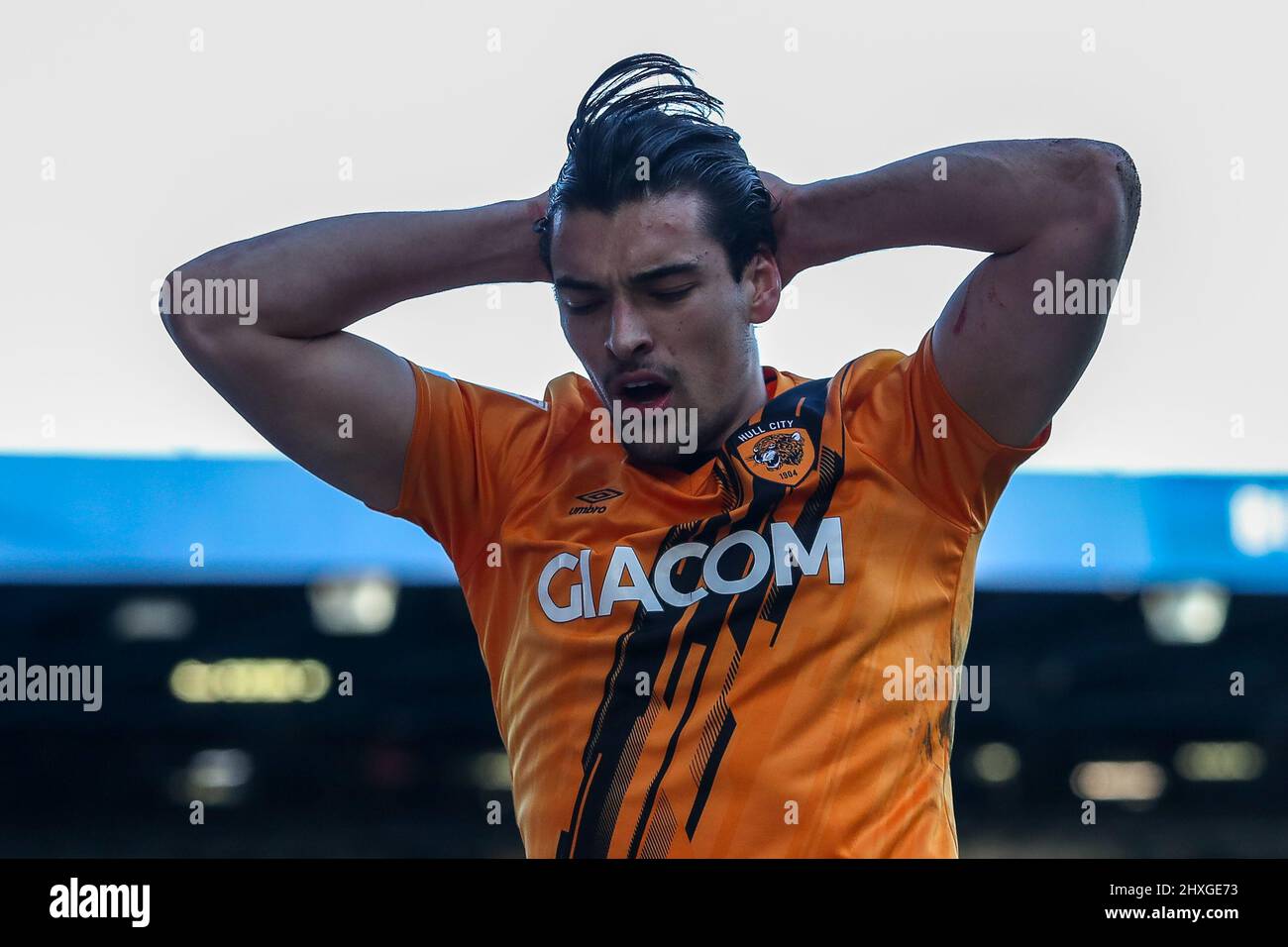 Jacob Greaves #4 of Hull City puts his hands to his head after missing ...