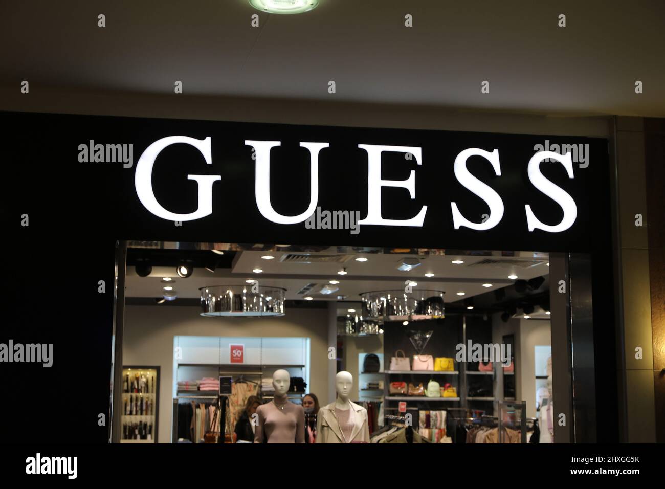 Branded Guess store seen at Saint-Petersburg shopping center. Several ...