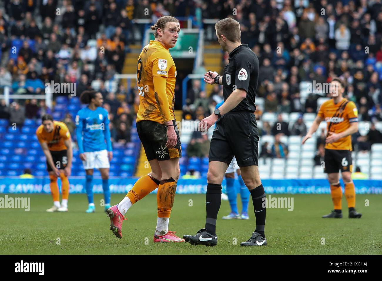 Referee Michael Salisbury speaks with Tom Eaves #9 of Hull City during ...