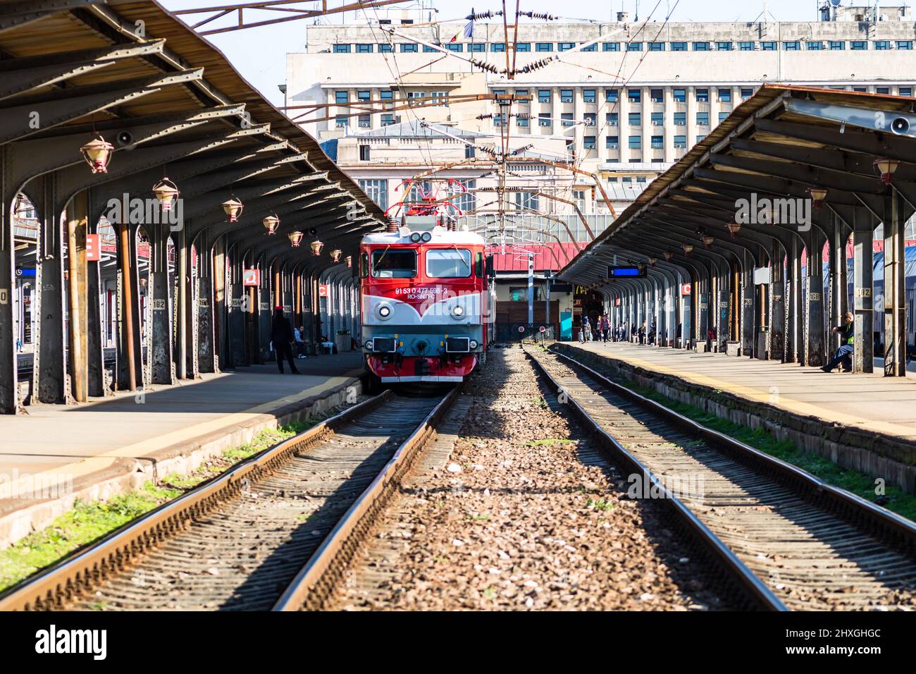Train in motion or at train platform at Bucharest North Railway Station ...