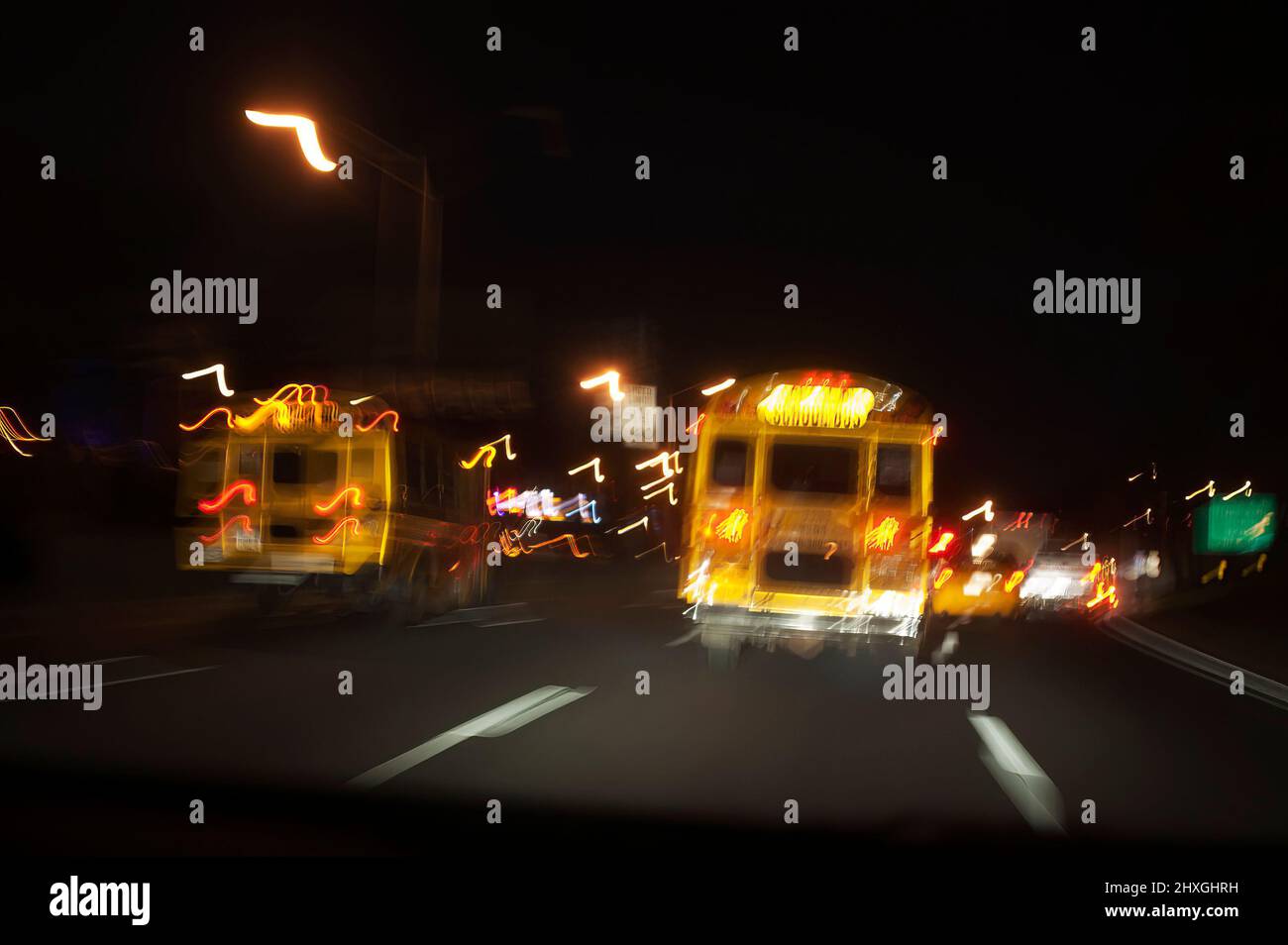 School bus on New York City street motion Stock Photo - Alamy